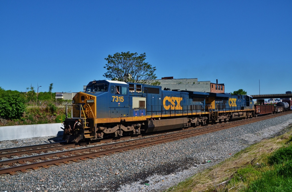 CSX 7315 and a wave.